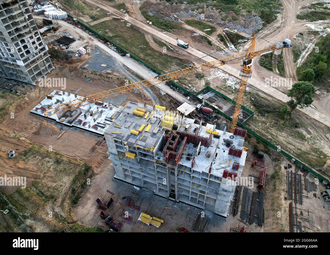 Crane during formworks on construction site. Pouring concrete into ...