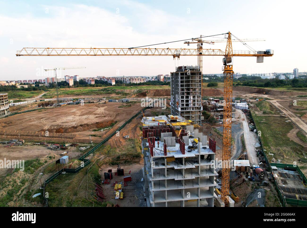 Crane during formworks on construction site. Pouring concrete into ...