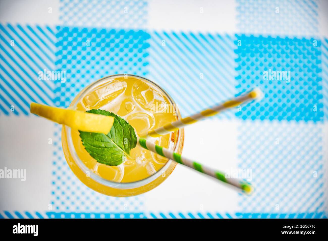 Refreshing glass of lemonade with mint and ice cubes Stock Photo - Alamy