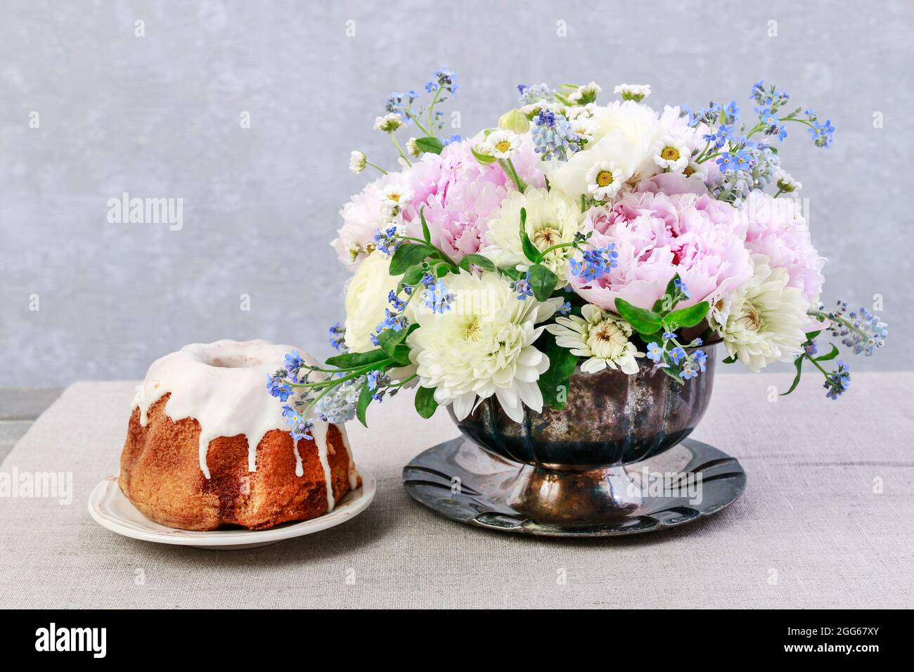 Floral arrangement with pink peonies, ranunculus flowers, white ...