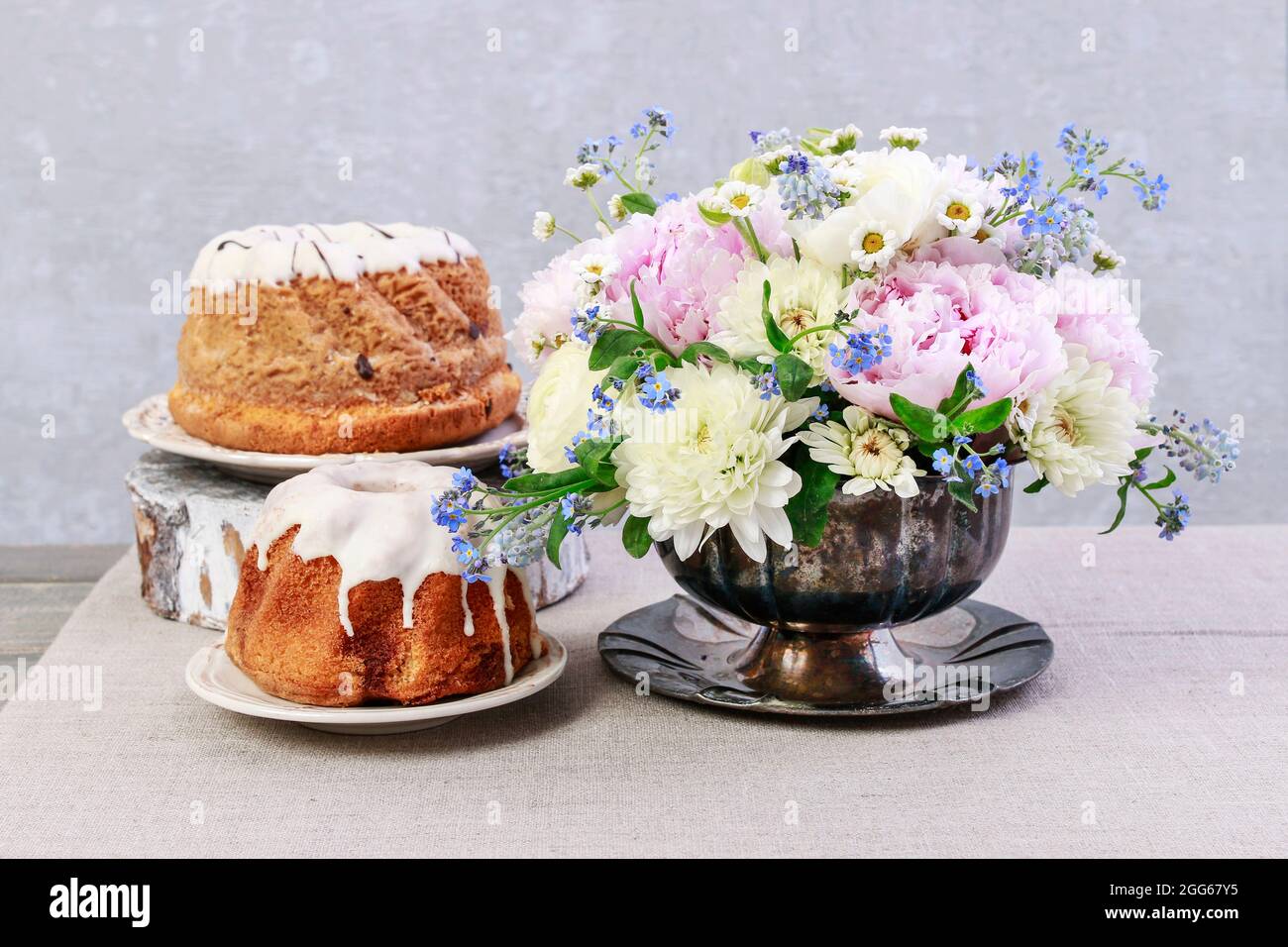 Floral arrangement with pink peonies, ranunculus flowers, white ...