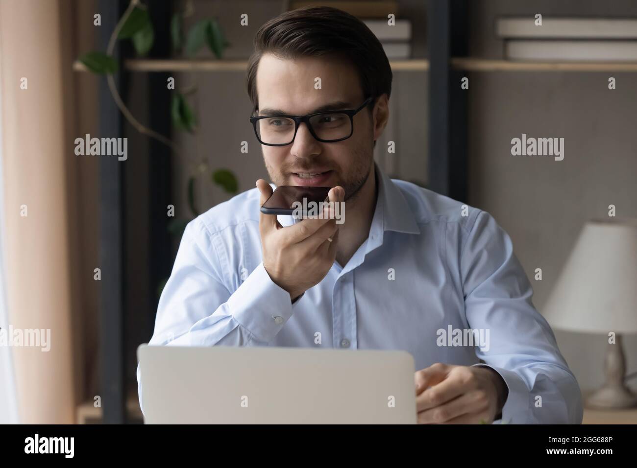Business man recording audio message hi-res stock photography and ...