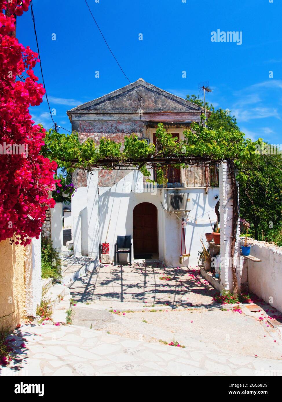 The town of Moraitika and the original folk buildings on the island of ...