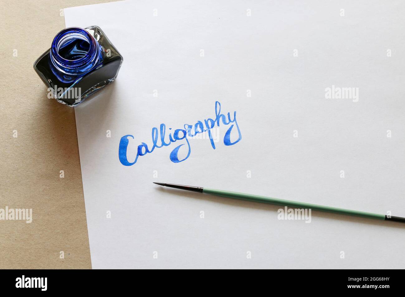 Calligraphy, handwritten letters on white paper. Retro style Stock ...