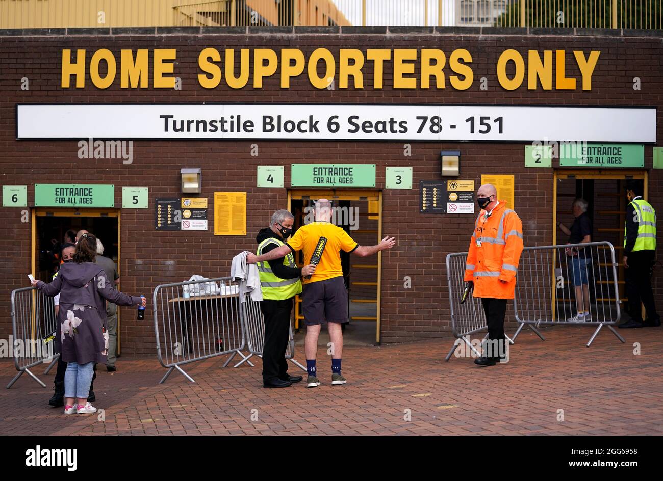 Security checks before fans enter the stadium before the Premier League ...