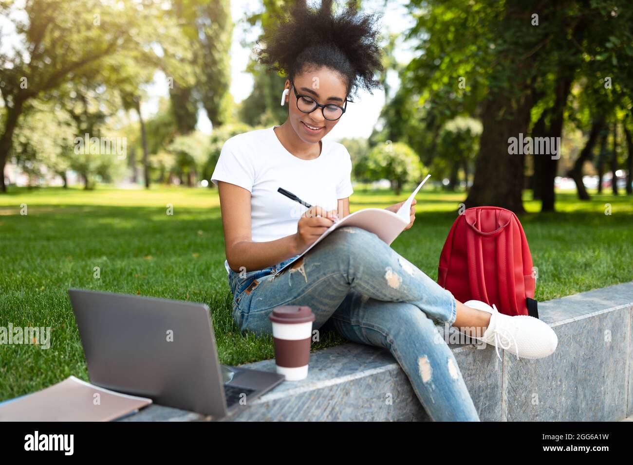 College student using laptop drawing hi-res stock photography and ...