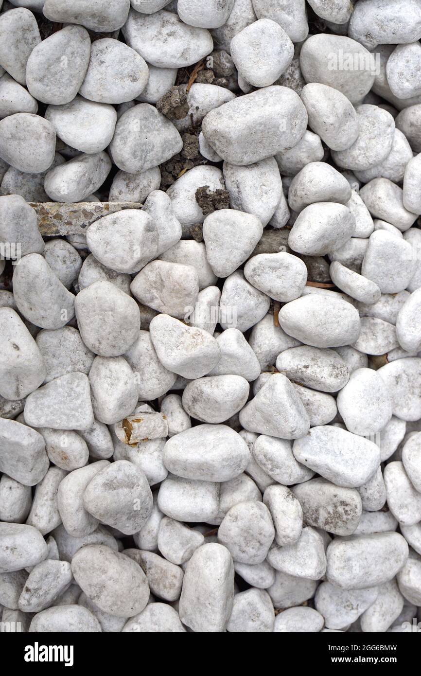 Decorative white pebble stones background texture Stock Photo - Alamy
