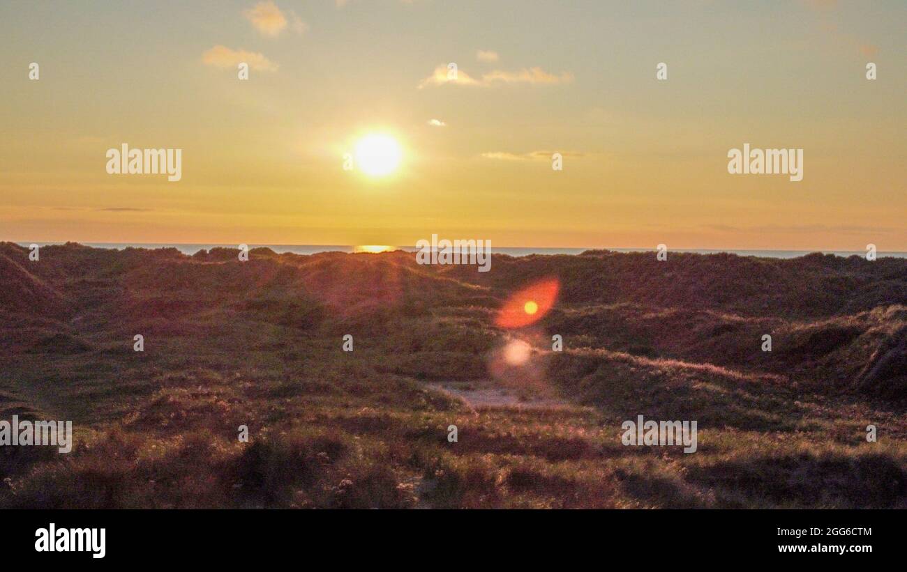 The beautiful sunset of the Welsh coast via Drone Stock Photo - Alamy