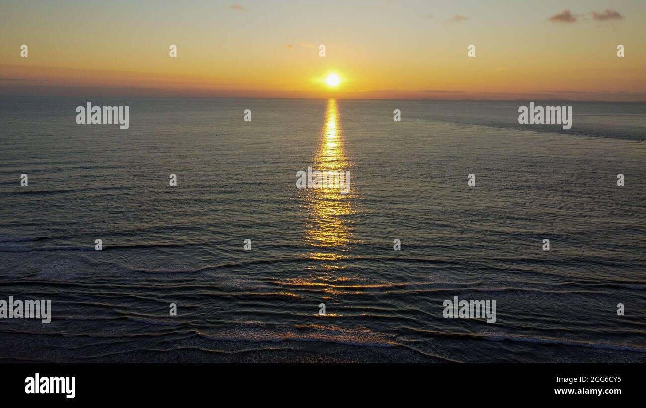 The beautiful sunset of the Welsh coast via Drone Stock Photo - Alamy