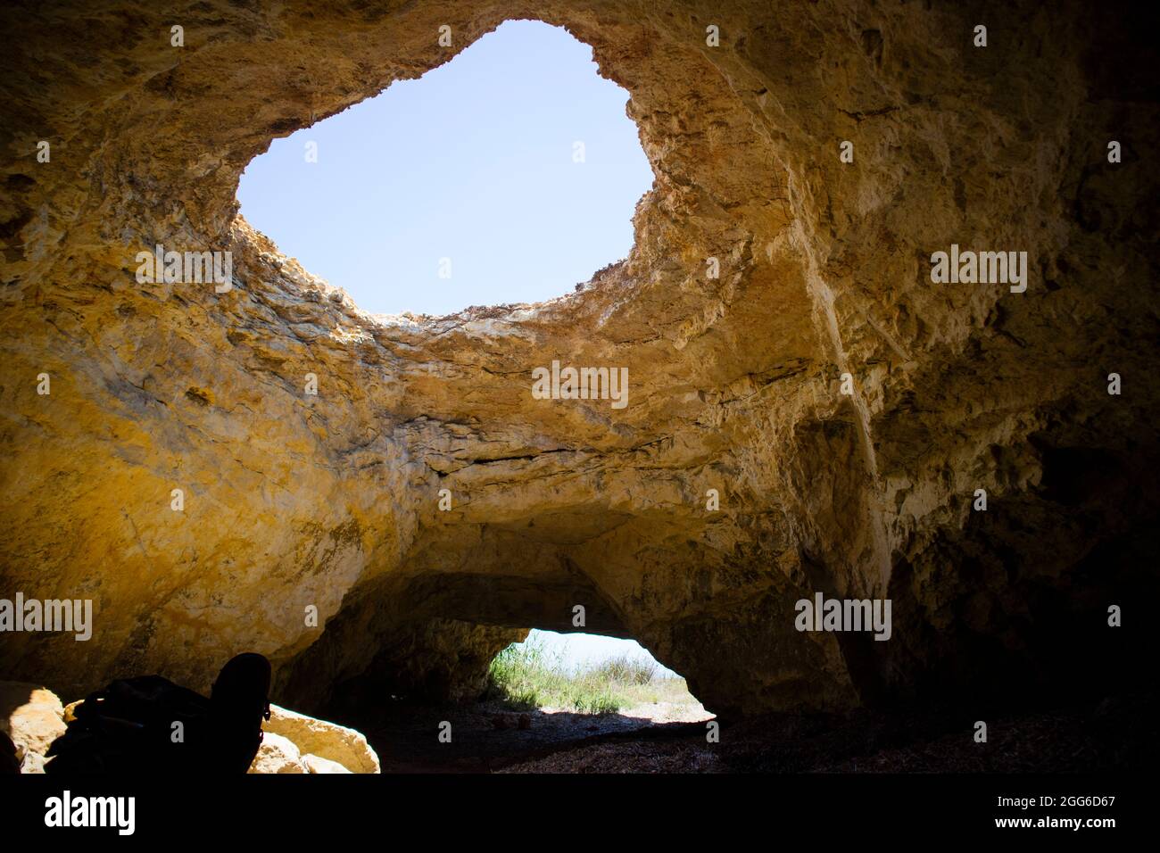 Internal view of the opening of a small natural cave Stock Photo - Alamy