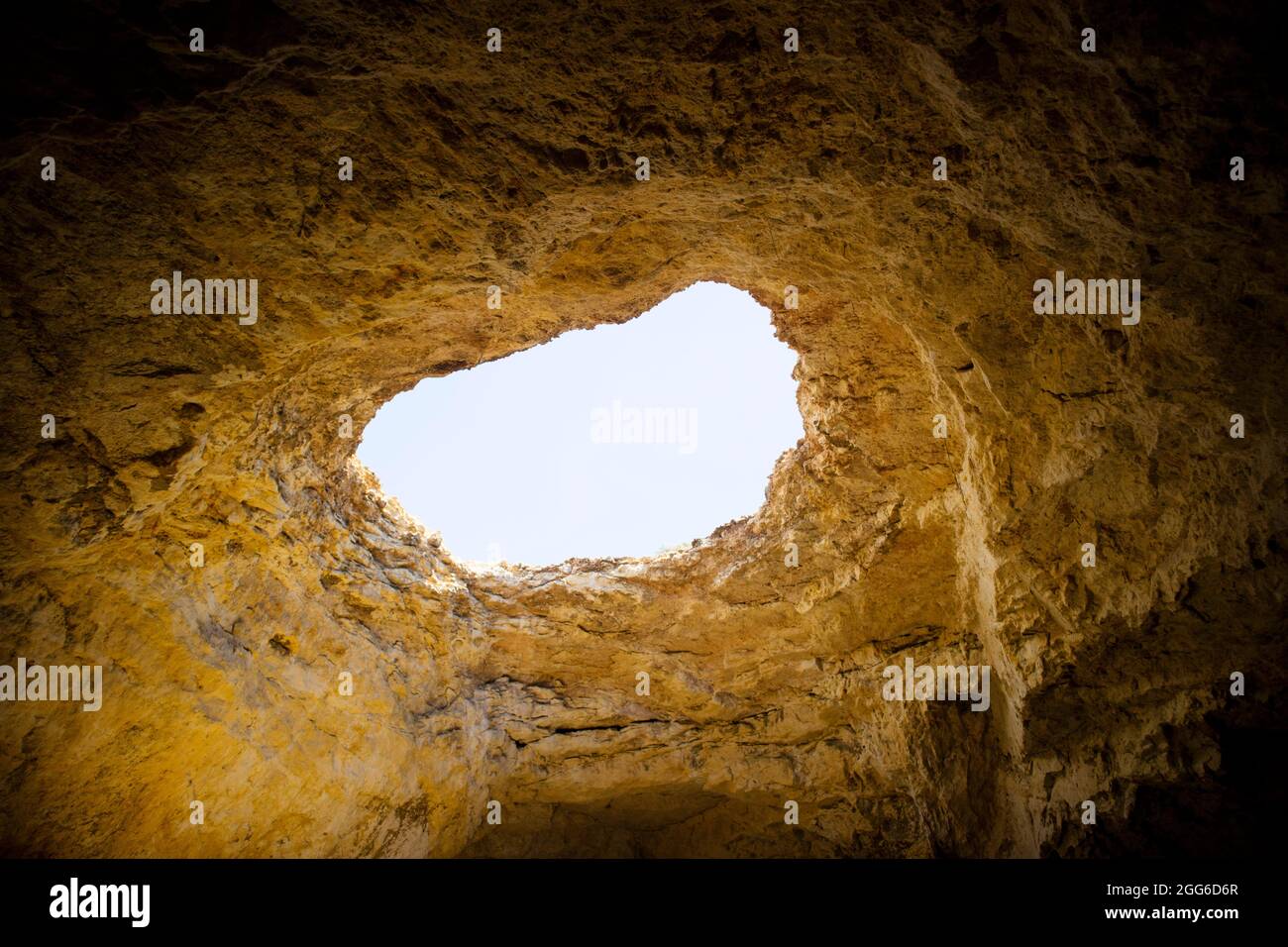 Internal view of the opening of a small natural cave Stock Photo - Alamy