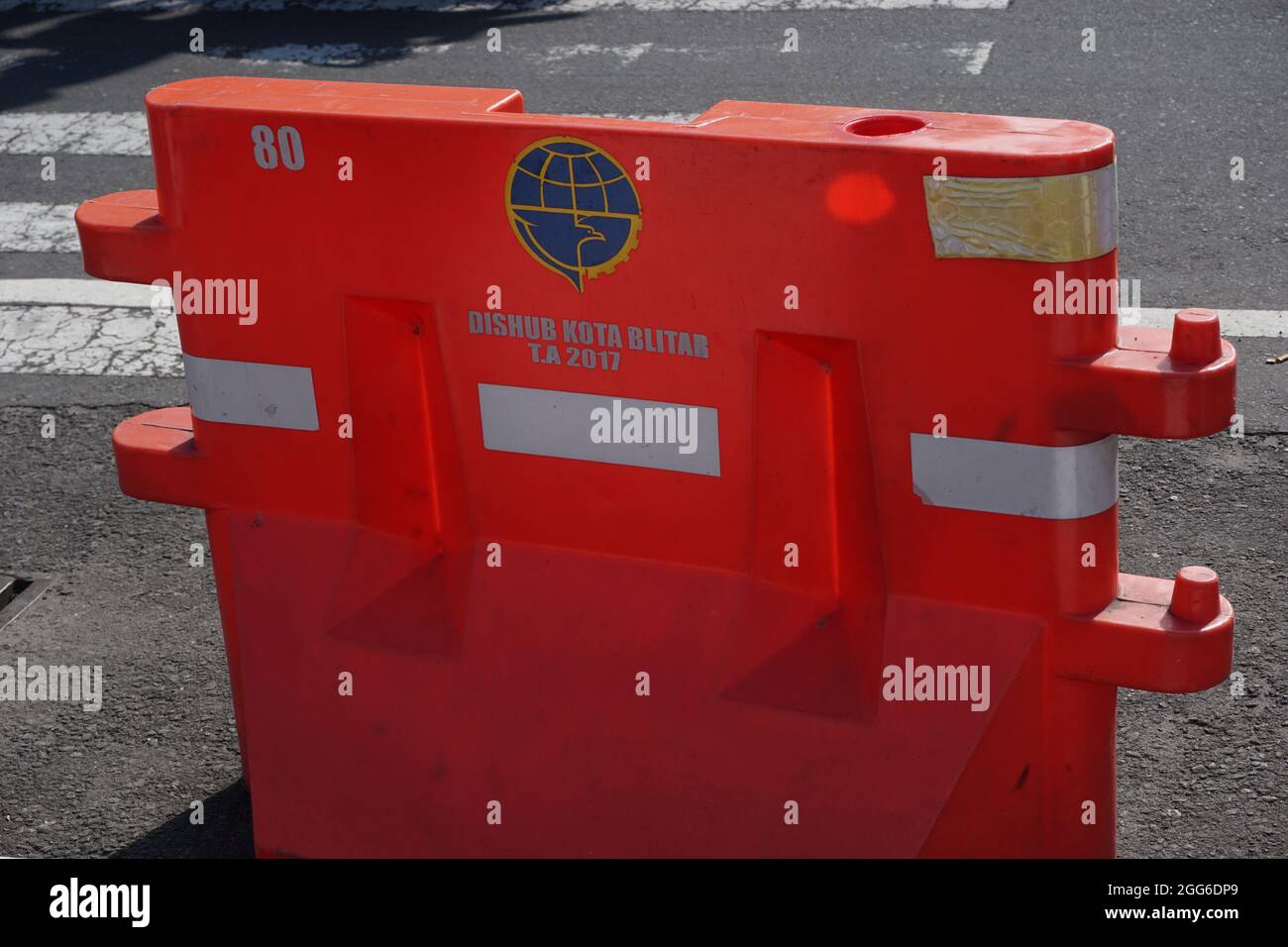 Red separator on the street Stock Photo - Alamy