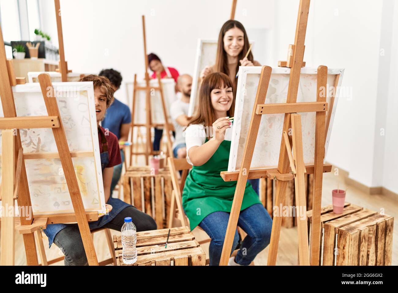 Group of young draw students smiling happy drawing at art studio Stock ...