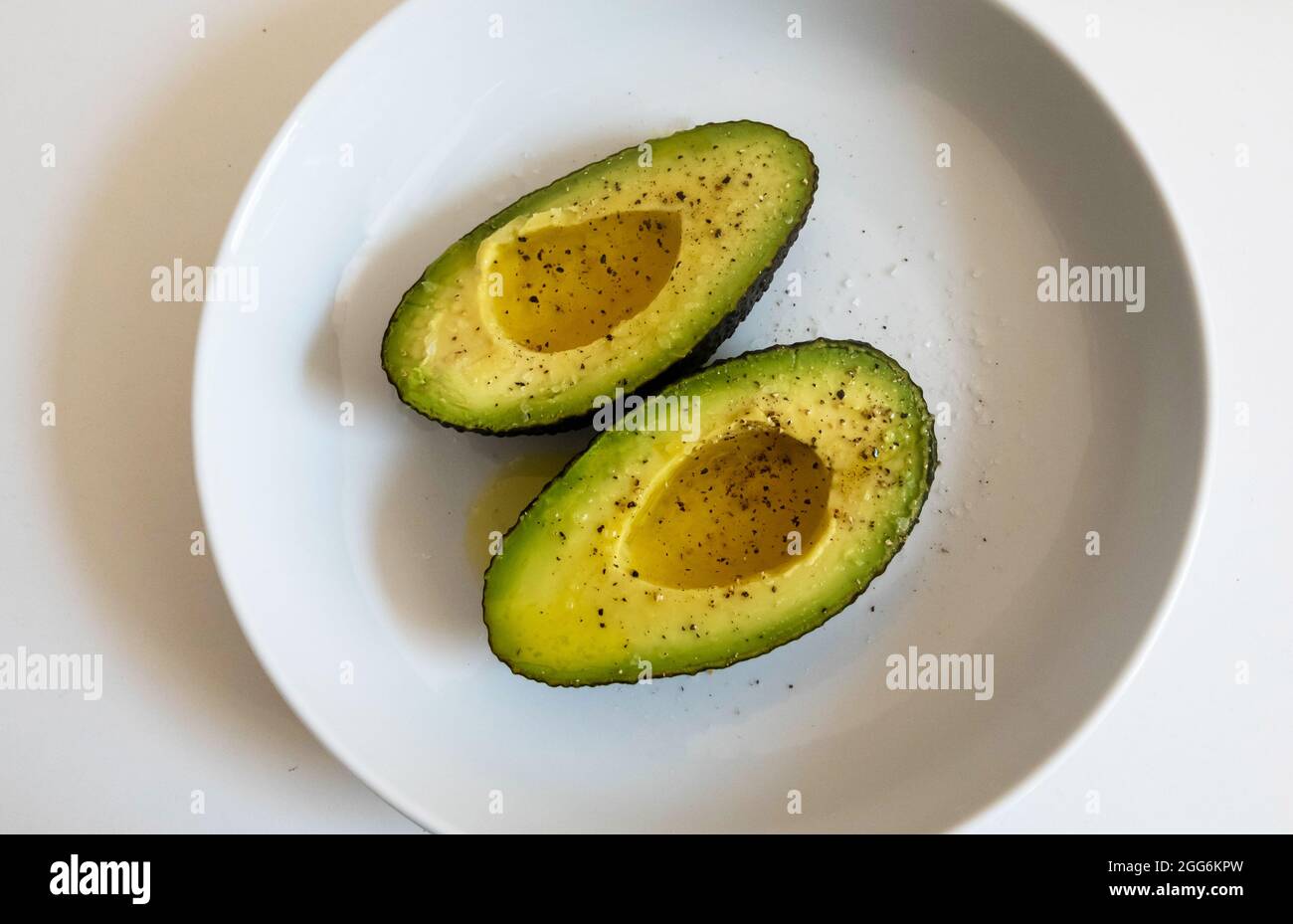 Avocado with salt hi-res stock photography and images - Alamy