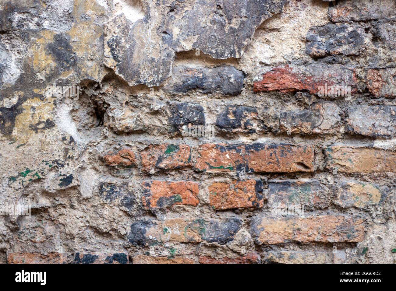 Old brick wall with peel stucco texture. Retro vintage worn wall ...