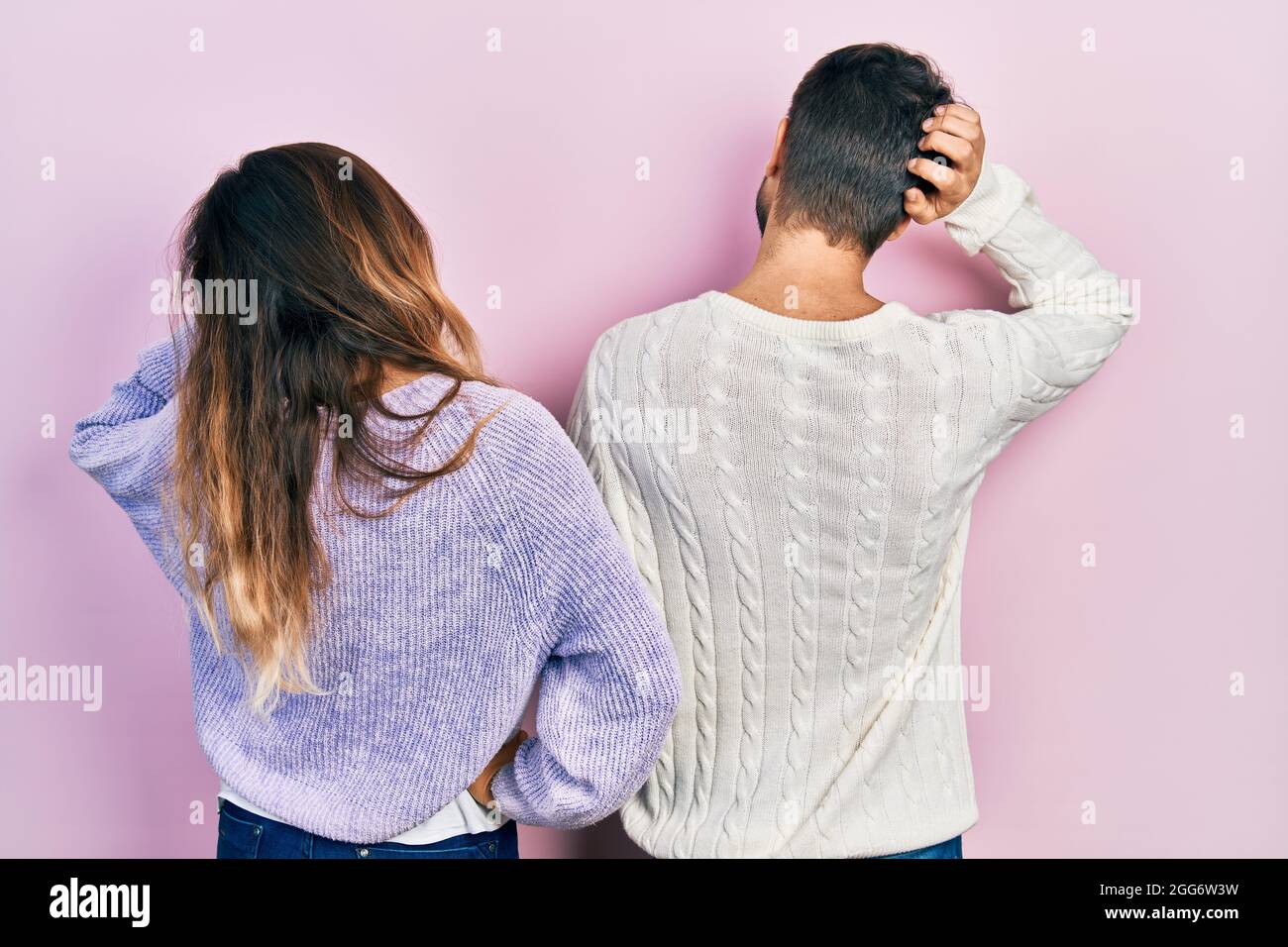 Beautiful couple standing backwards hi-res stock photography and images ...