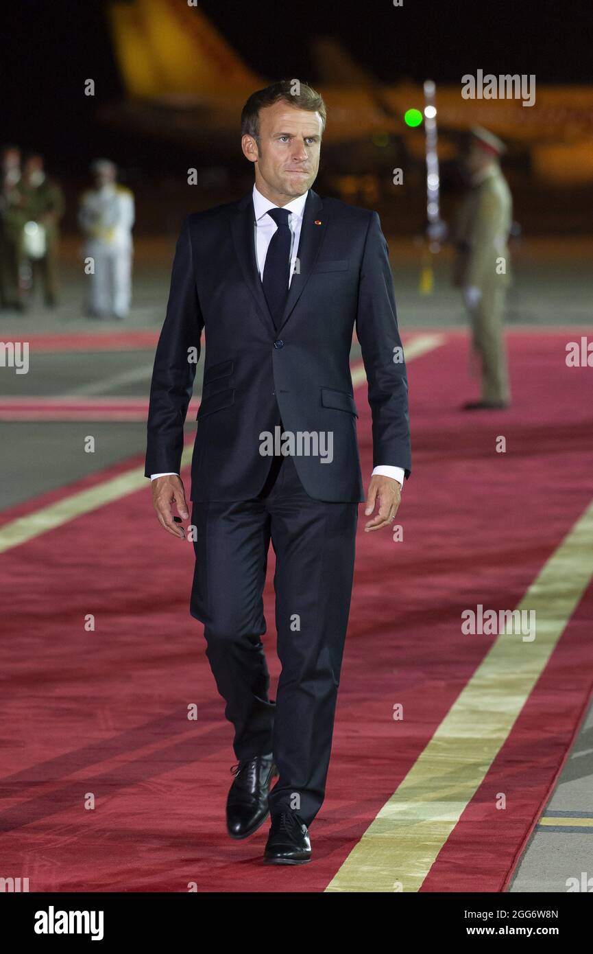 French president Emmanuel Macron walk during a welcoming ceremony at ...