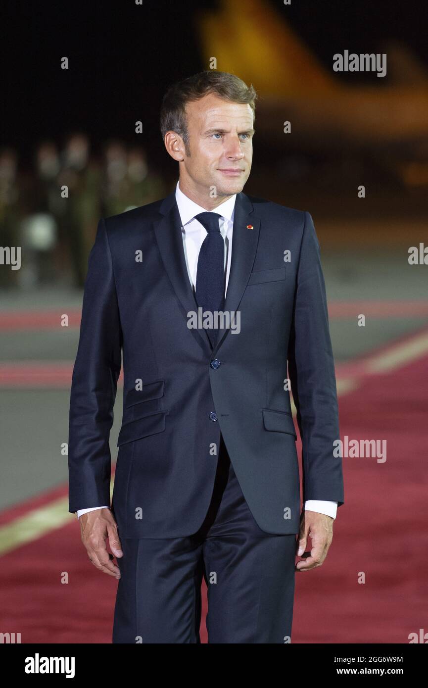 French president Emmanuel Macron walk during a welcoming ceremony at ...