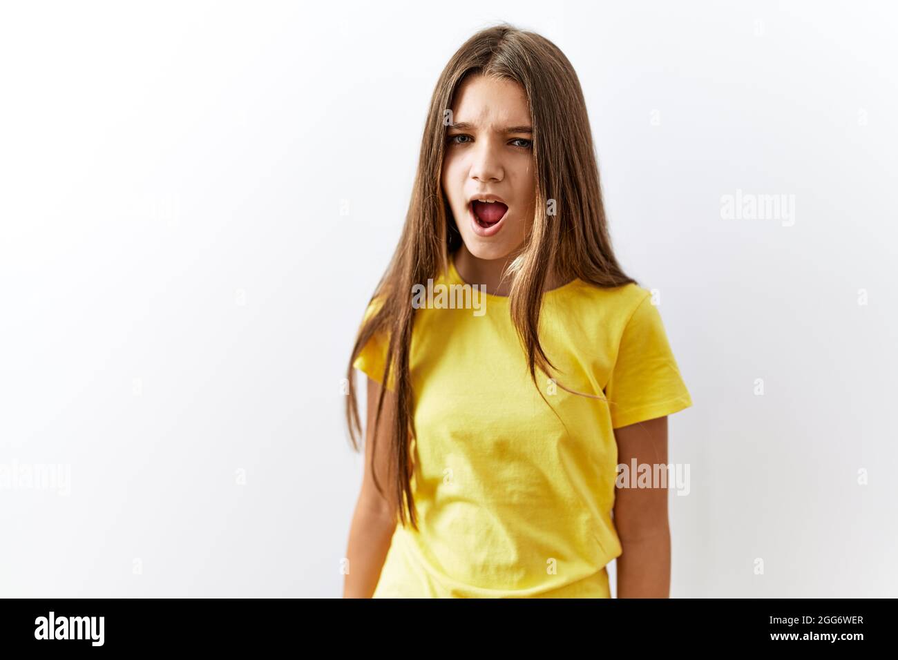 Young brunette teenager standing together over isolated background ...