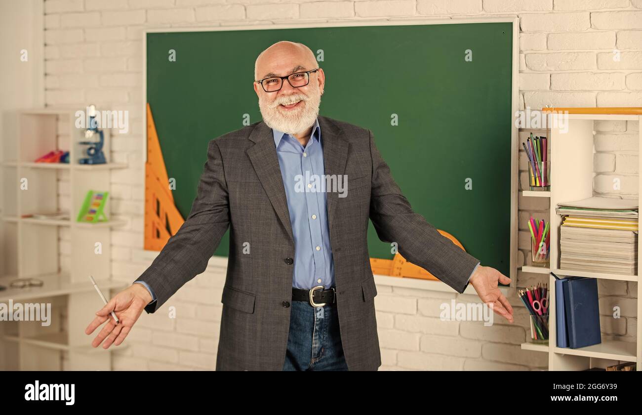 loving mathematics. become good at math. stem in classroom. senior man ...