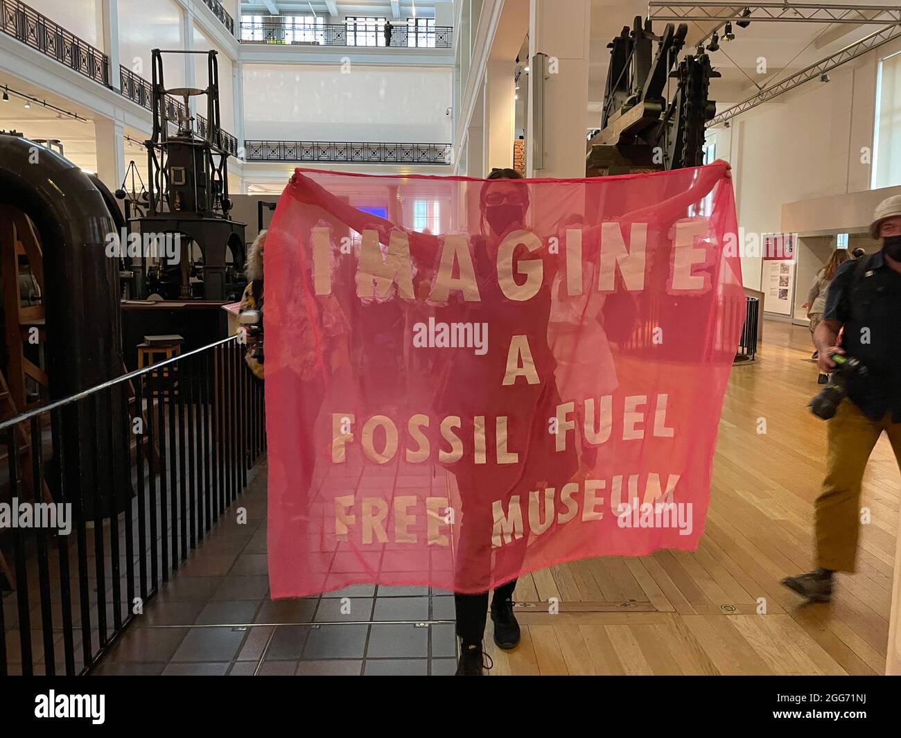 Members of Extinction Rebellion take part in a protest inside the ...