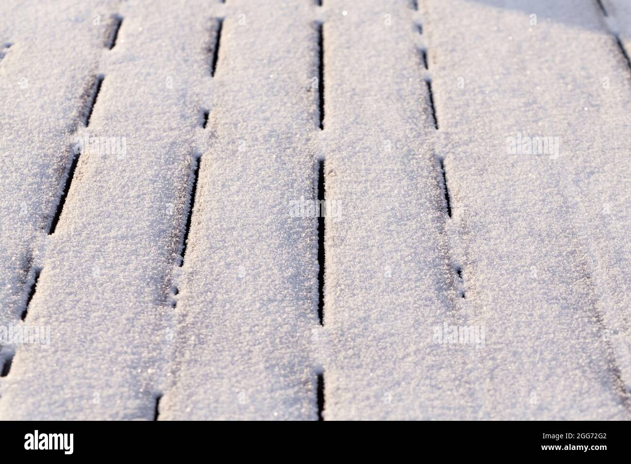 Snow covered wood terrace floor background texture Stock Photo - Alamy