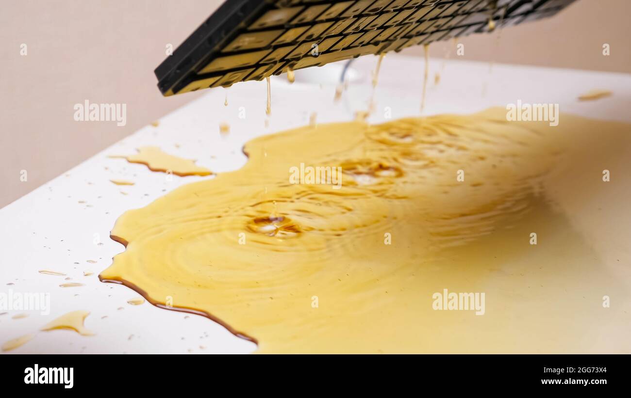 Drink spill keyboard hi-res stock photography and images - Alamy