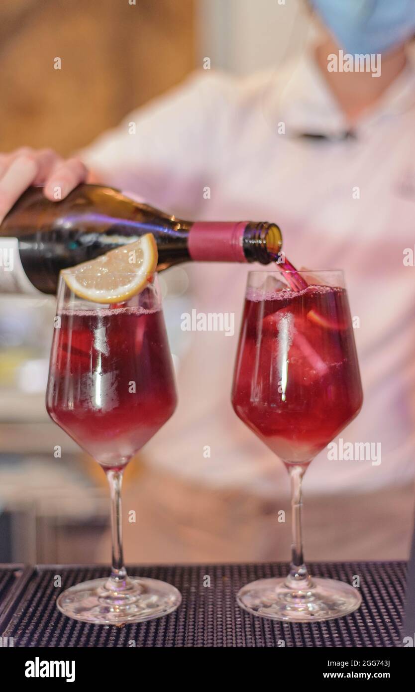 Glass of red wine sangria in a restaurant Stock Photo - Alamy