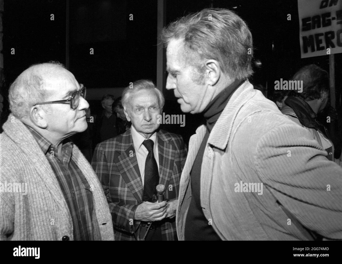 **FILE PHOTO** Ed Asner Has Passed Away. Ed Asner and Charlton Heston ...