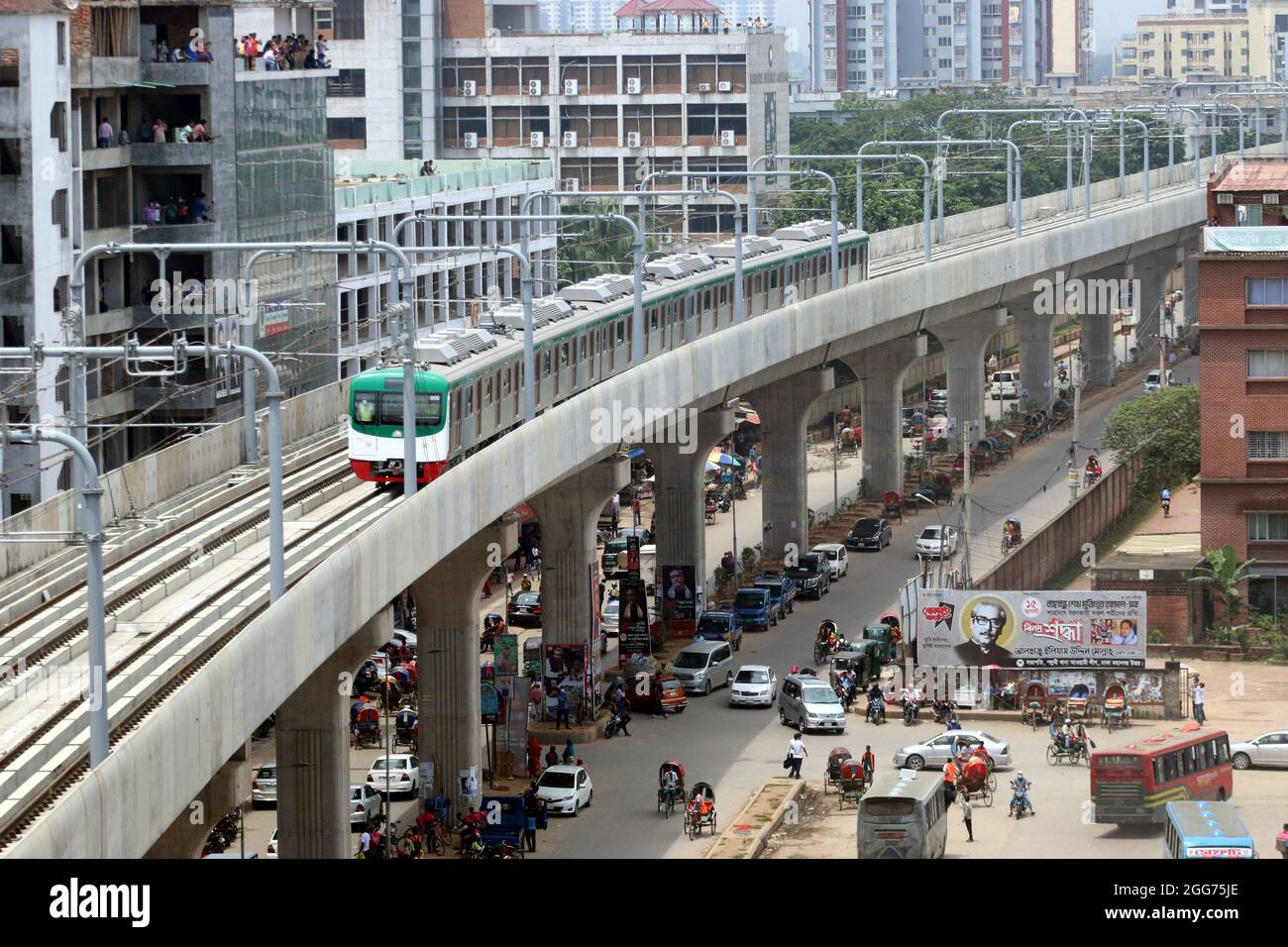Aerial view of a pilot drives the electric metro rail train on the ...
