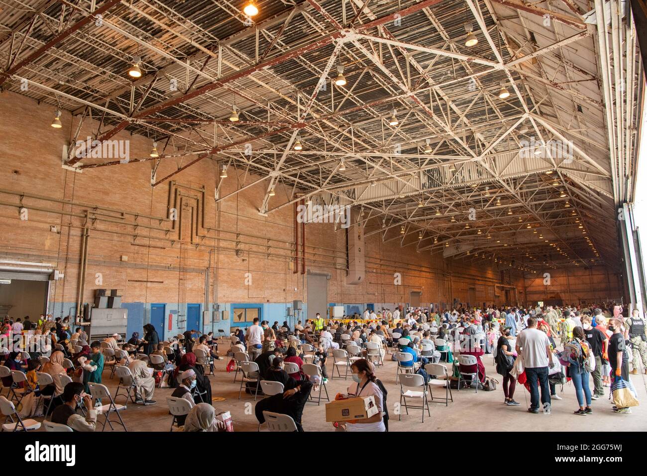 NAVAL STATION ROTA, Spain (Aug. 27, 2021) Evacuees from Afghanistan ...