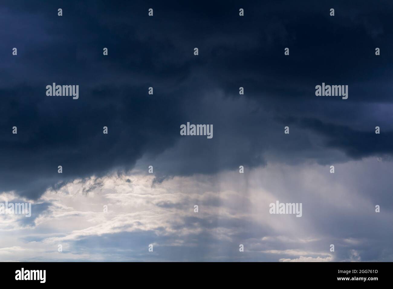 Dramatic storm cumulus cloud sky with rain Stock Photo - Alamy