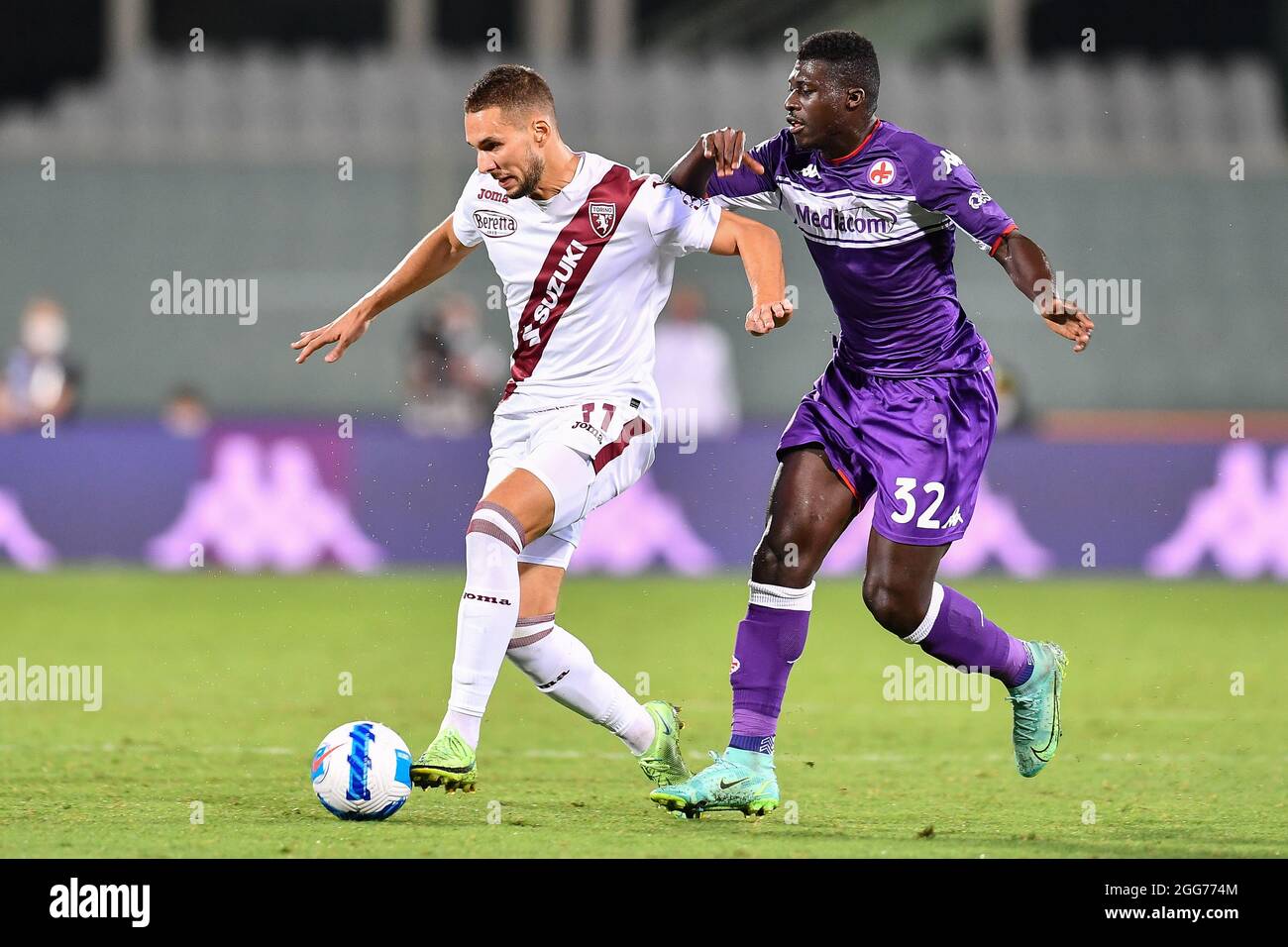 Florence, Italy. 28th Aug, 2021. Marko Pjaca (Torino) and Alfred Duncan ...