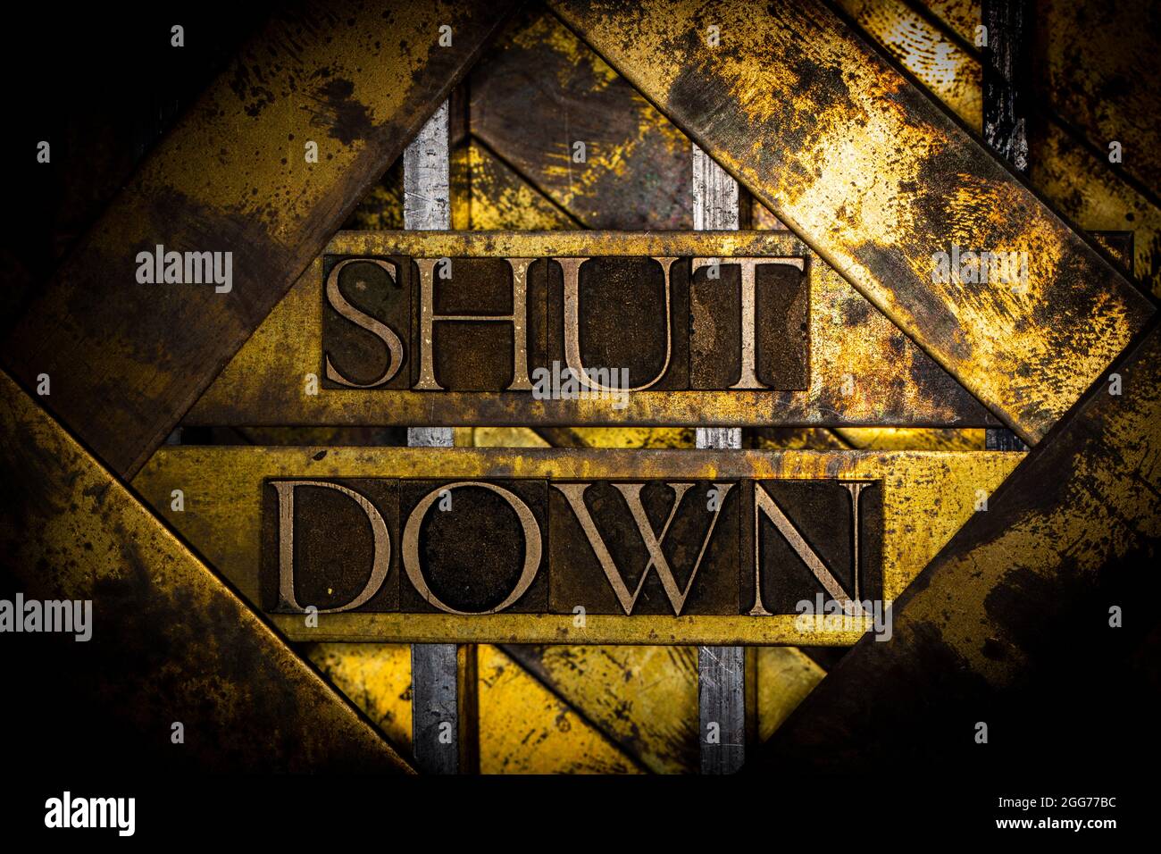 Shut Down text formed with real authentic typeset letters on vintage ...