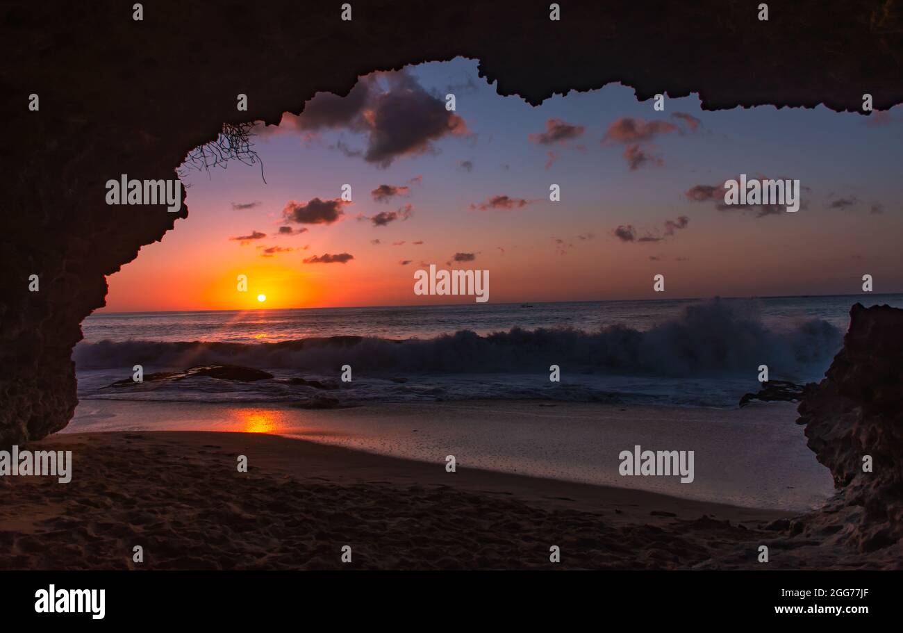 sunset from bali cave Stock Photo - Alamy