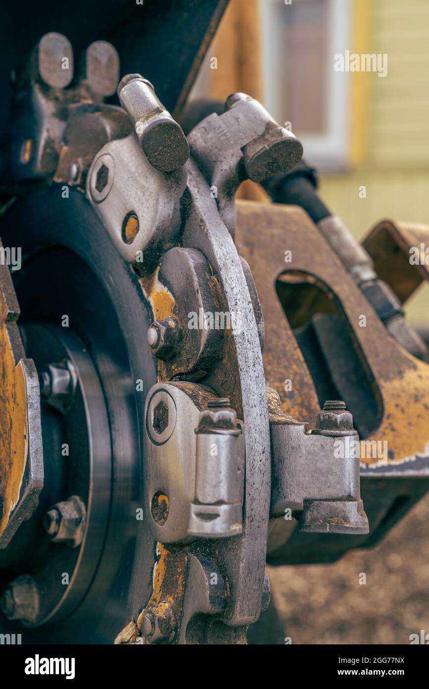 Close-up of stump grinder for cutting disc and teeth. It is clear that ...