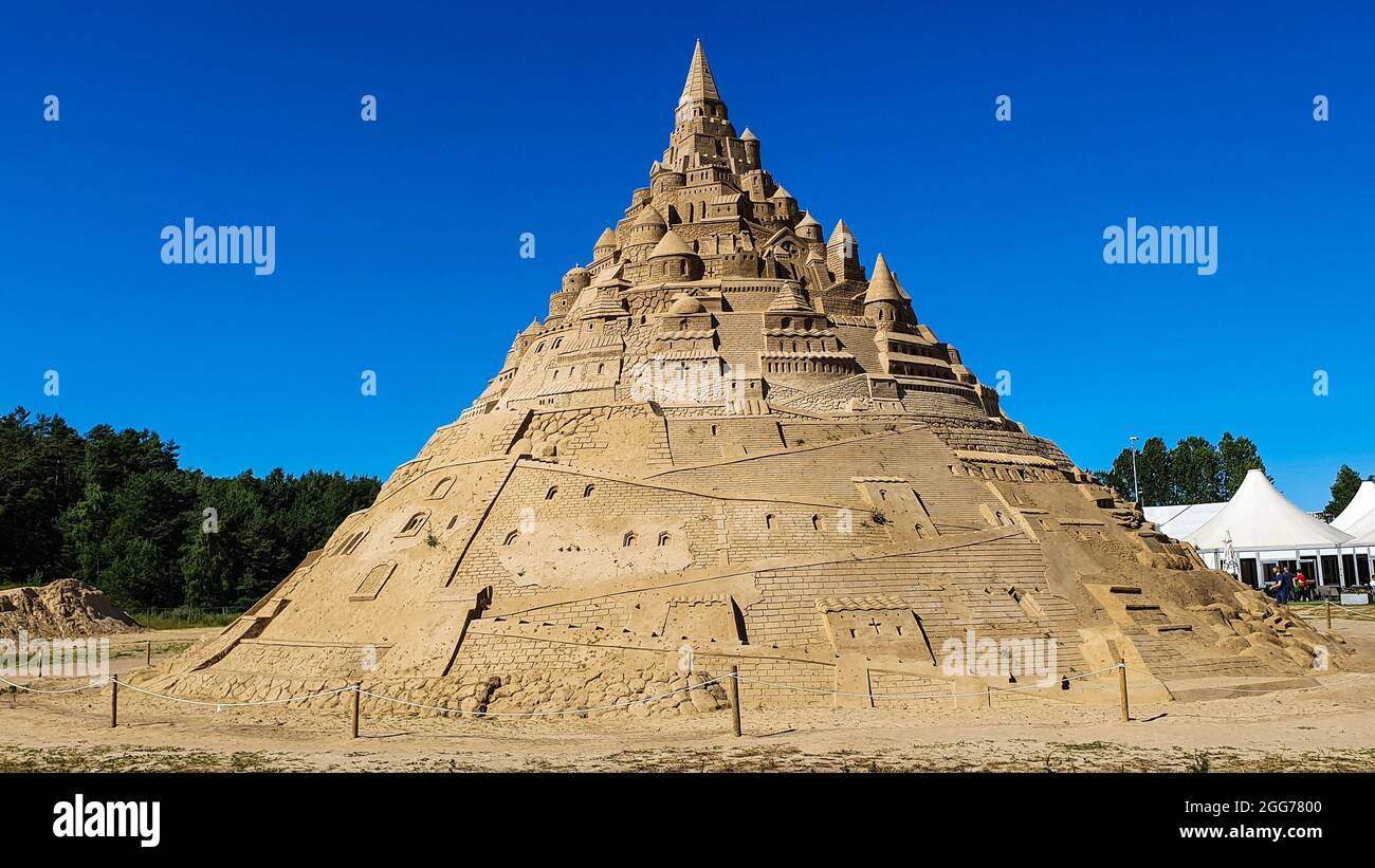 The world's biggest sandcastle surrounded by greenery in a park in ...