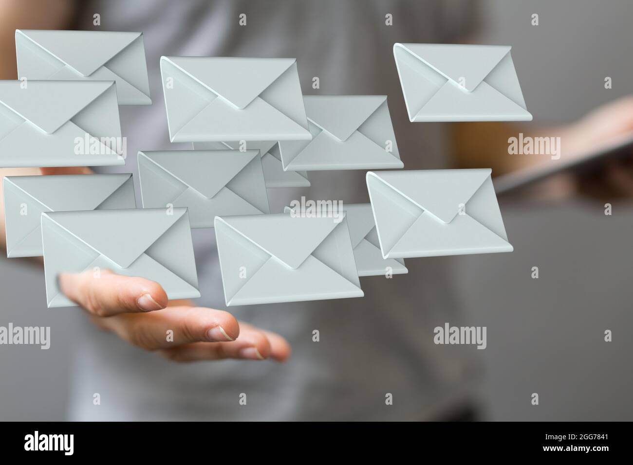 A network communications concept with floating letter signs on a hand ...