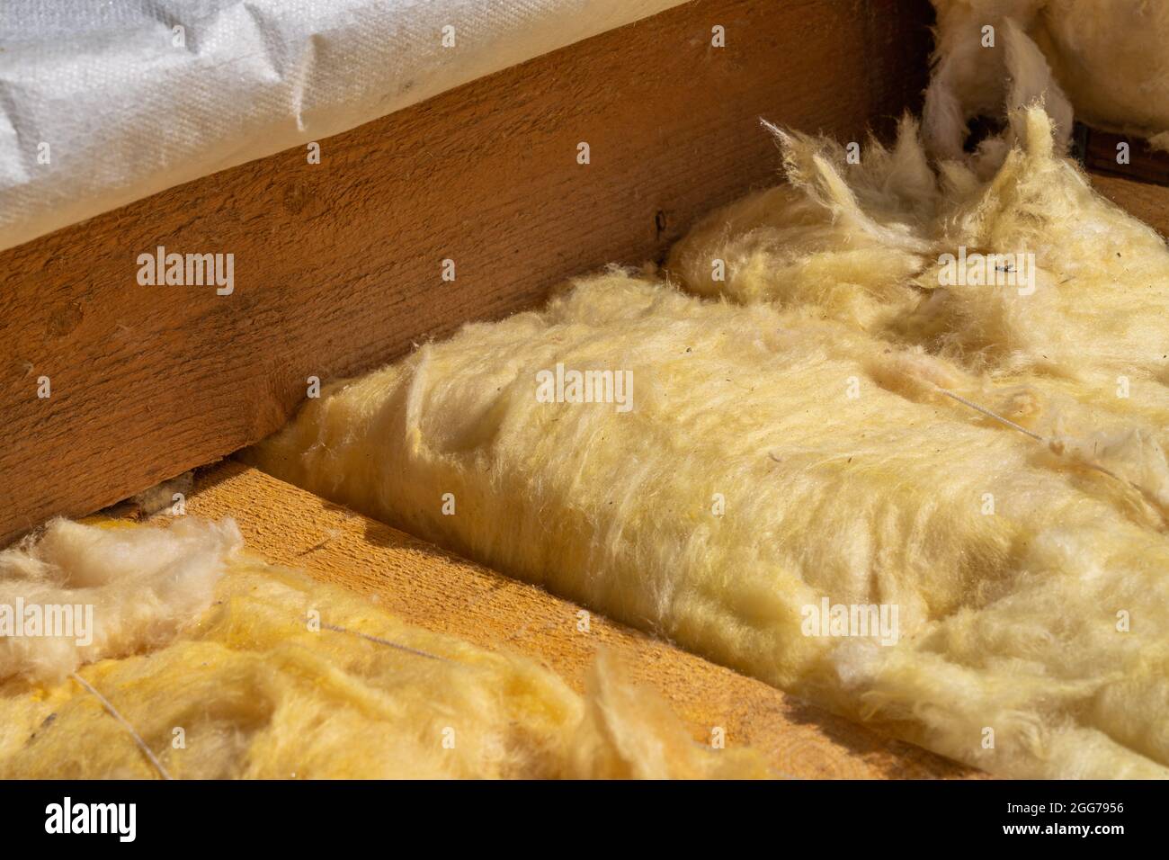 close-up of roof rafters and stone wool insulation open roof pie with ...