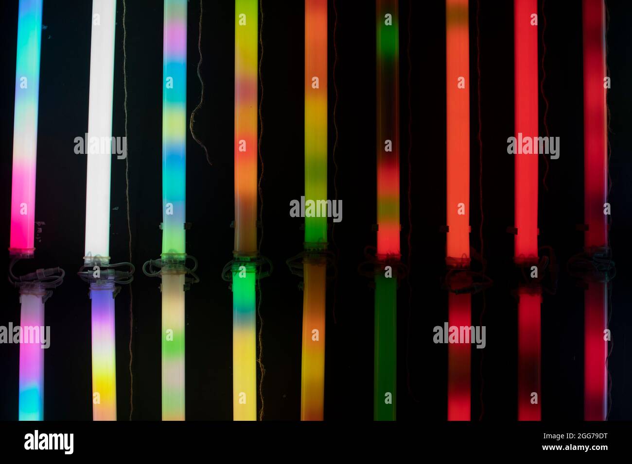 Colored RGB lamps. The glow of all colors from fluorescent lamps in the ...