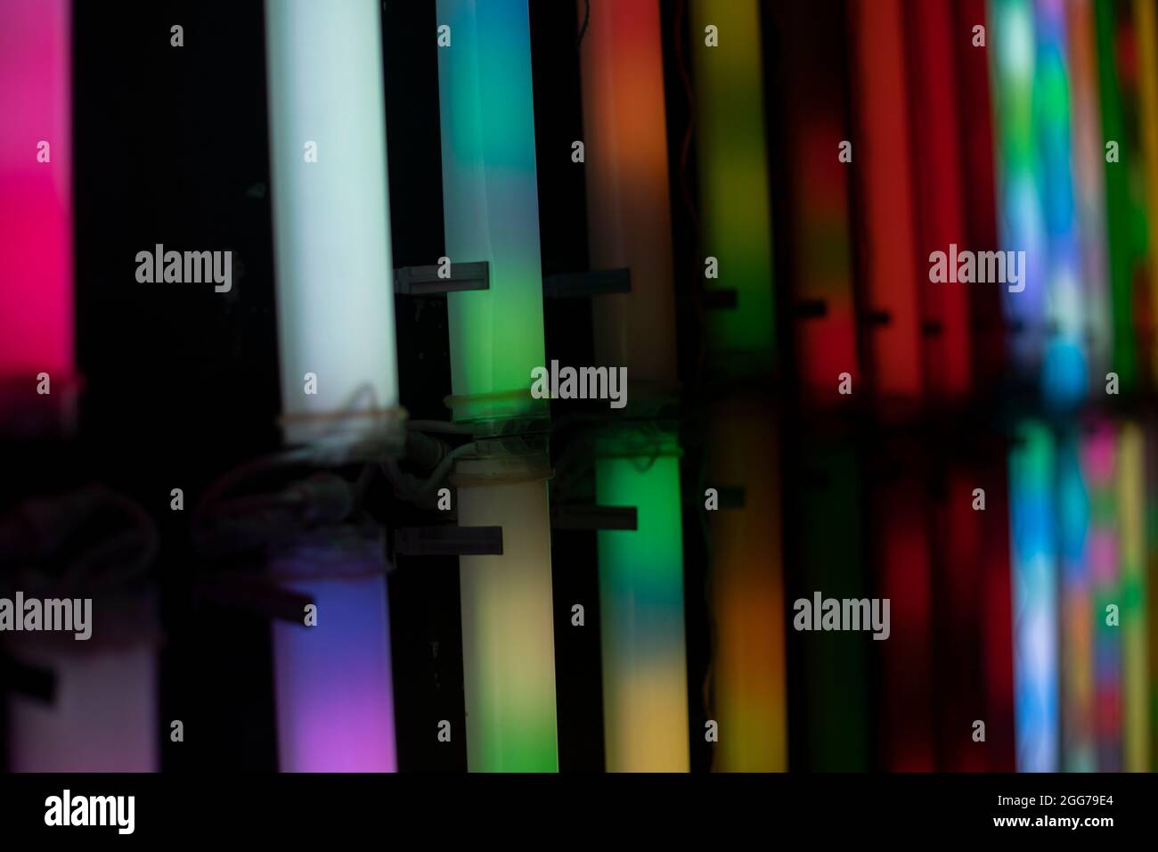 Colored RGB lamps. The glow of all colors from fluorescent lamps in the ...
