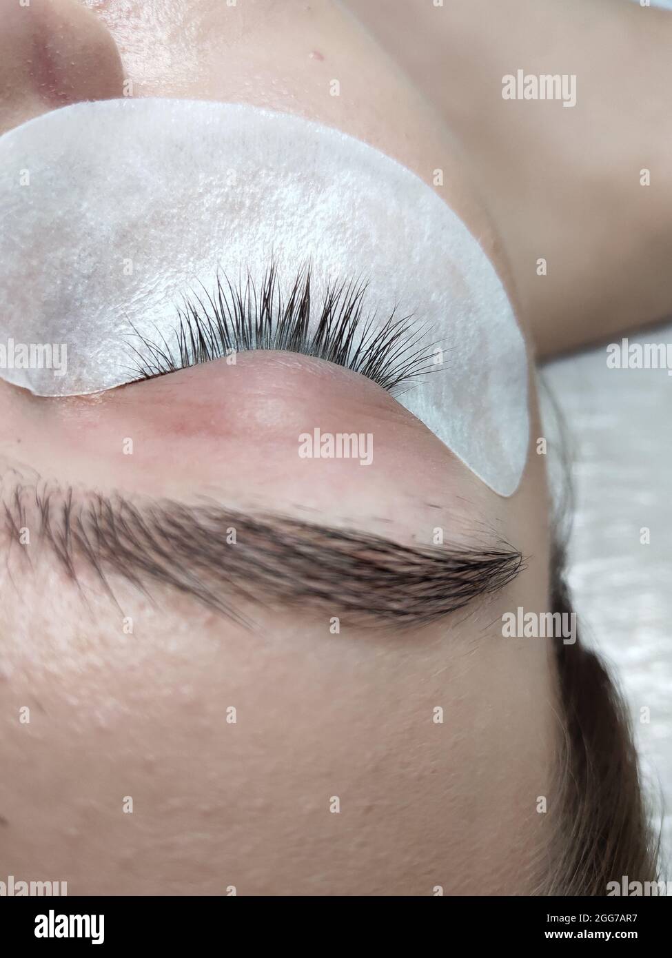 Lash extensions in beauty salon before and after Stock Photo - Alamy