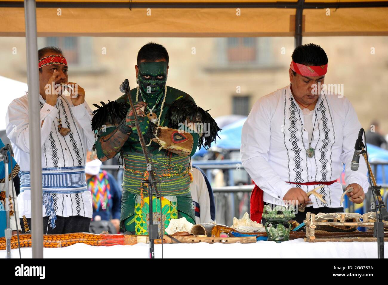 A man dressed as aztec warrior takes part during a ceremony before the ...