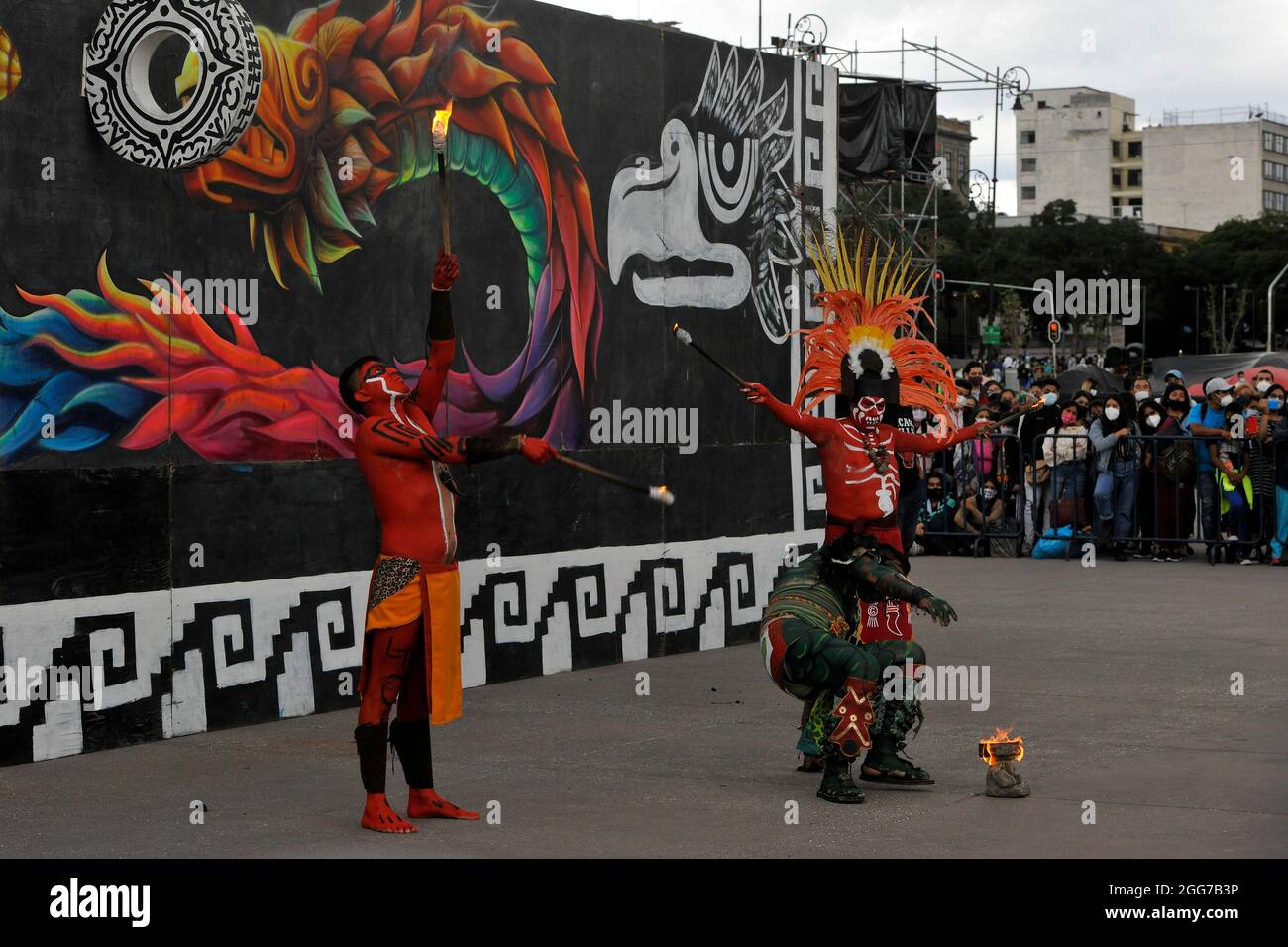 A man dressed as aztec warrior takes part during a ceremony before the ...