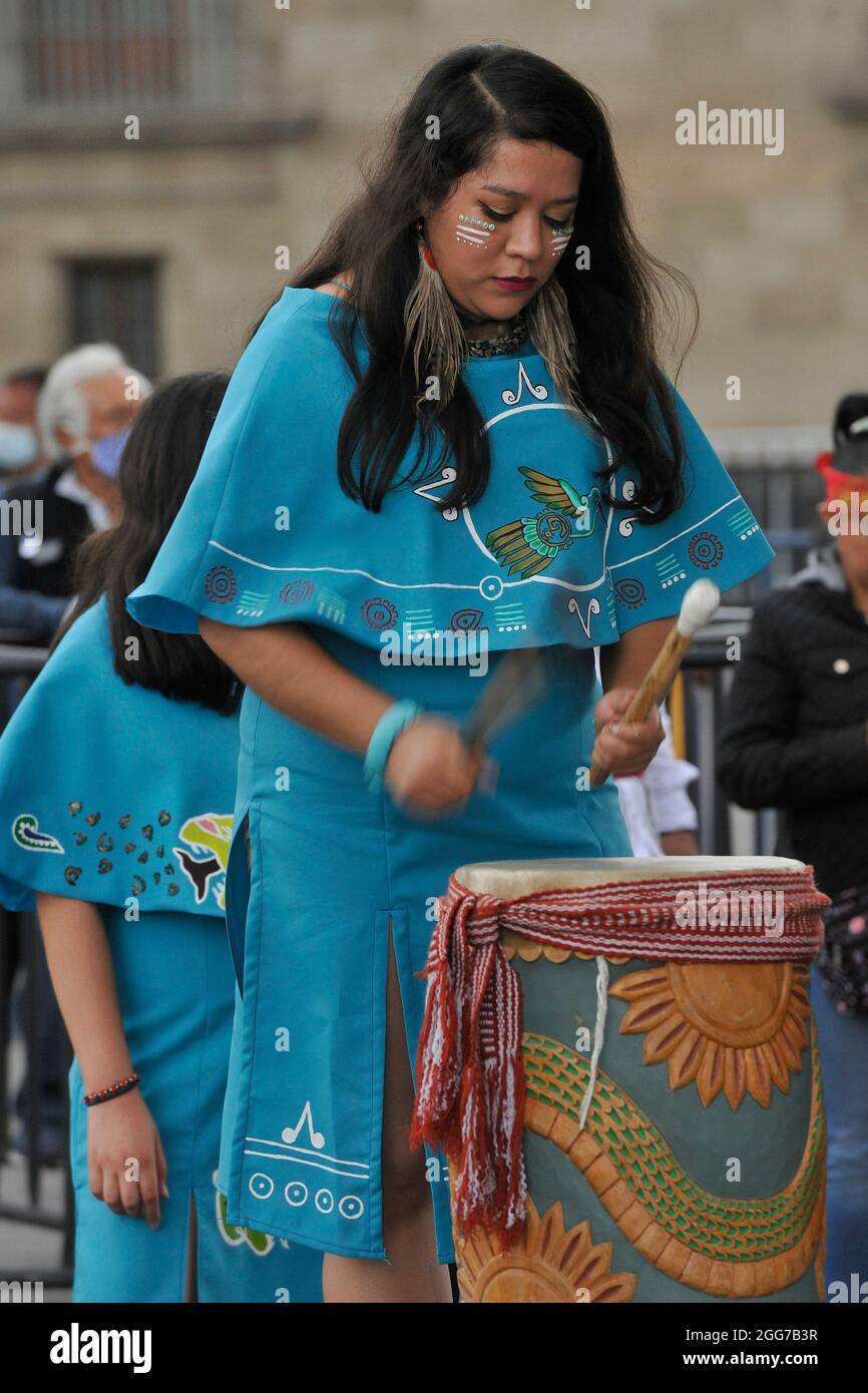A woman dressed as aztec goddess takes part during a ceremony before ...
