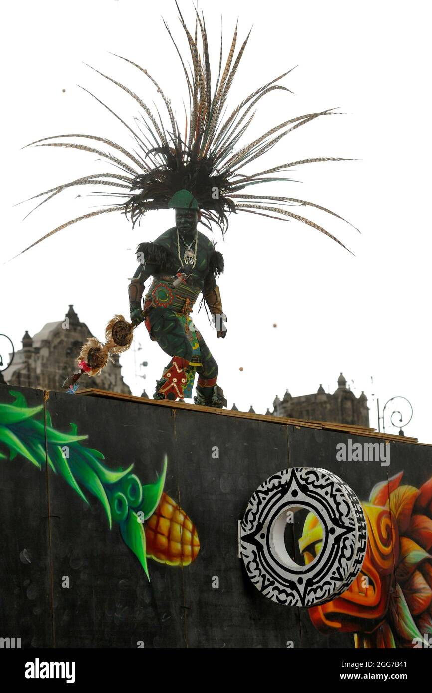 A man dressed as aztec warrior takes part during a ceremony before the ...