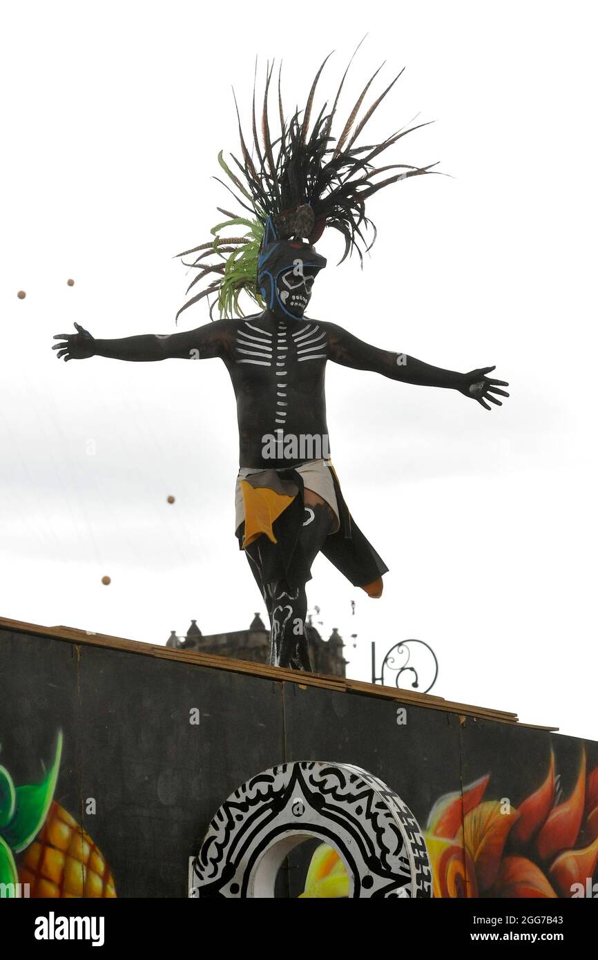 A man dressed as aztec warrior takes part during a ceremony before the ...