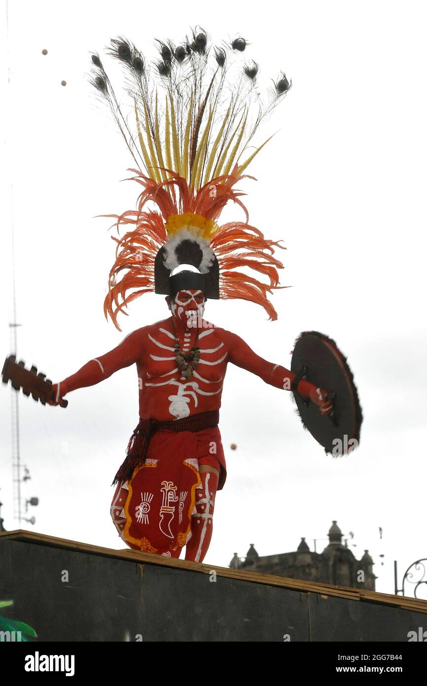 A man dressed as aztec warrior takes part during a ceremony before the ...