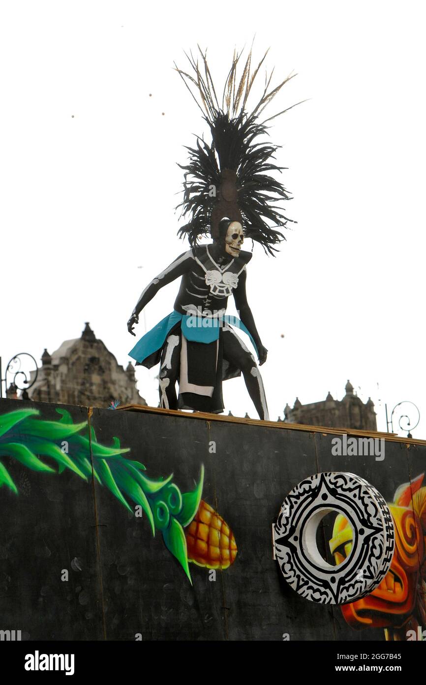 A man dressed as aztec warrior takes part during a ceremony before the ...