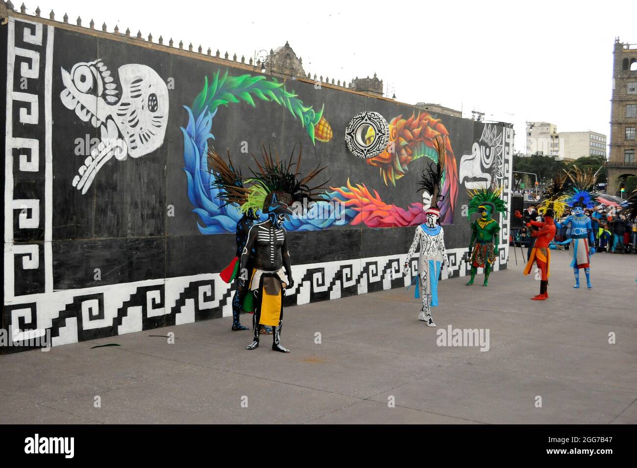 A man dressed as aztec warrior takes part during a ceremony before the ...